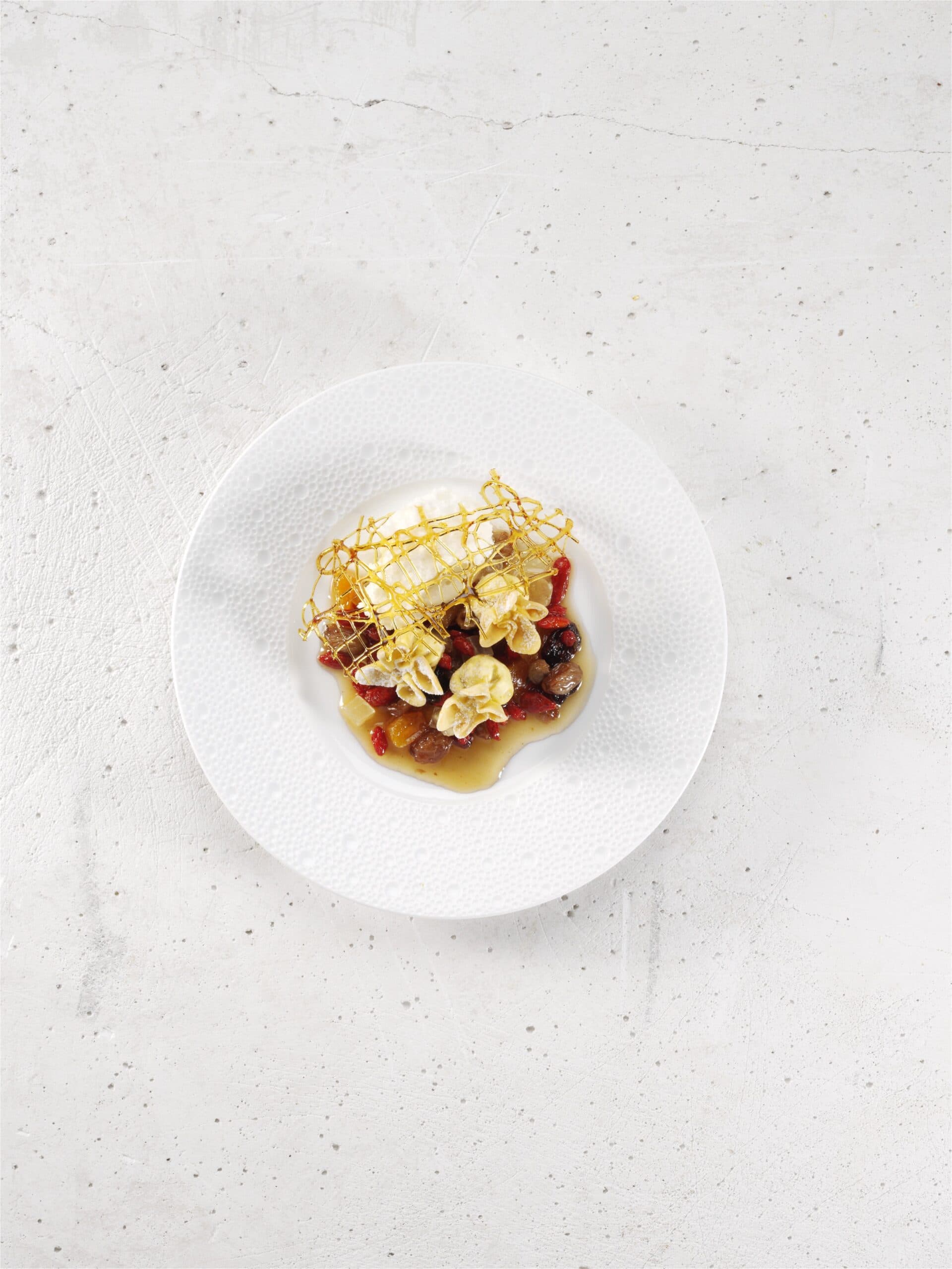 Cheese and pear Fiocchi® with winter fruit salad, spiced orange and ...